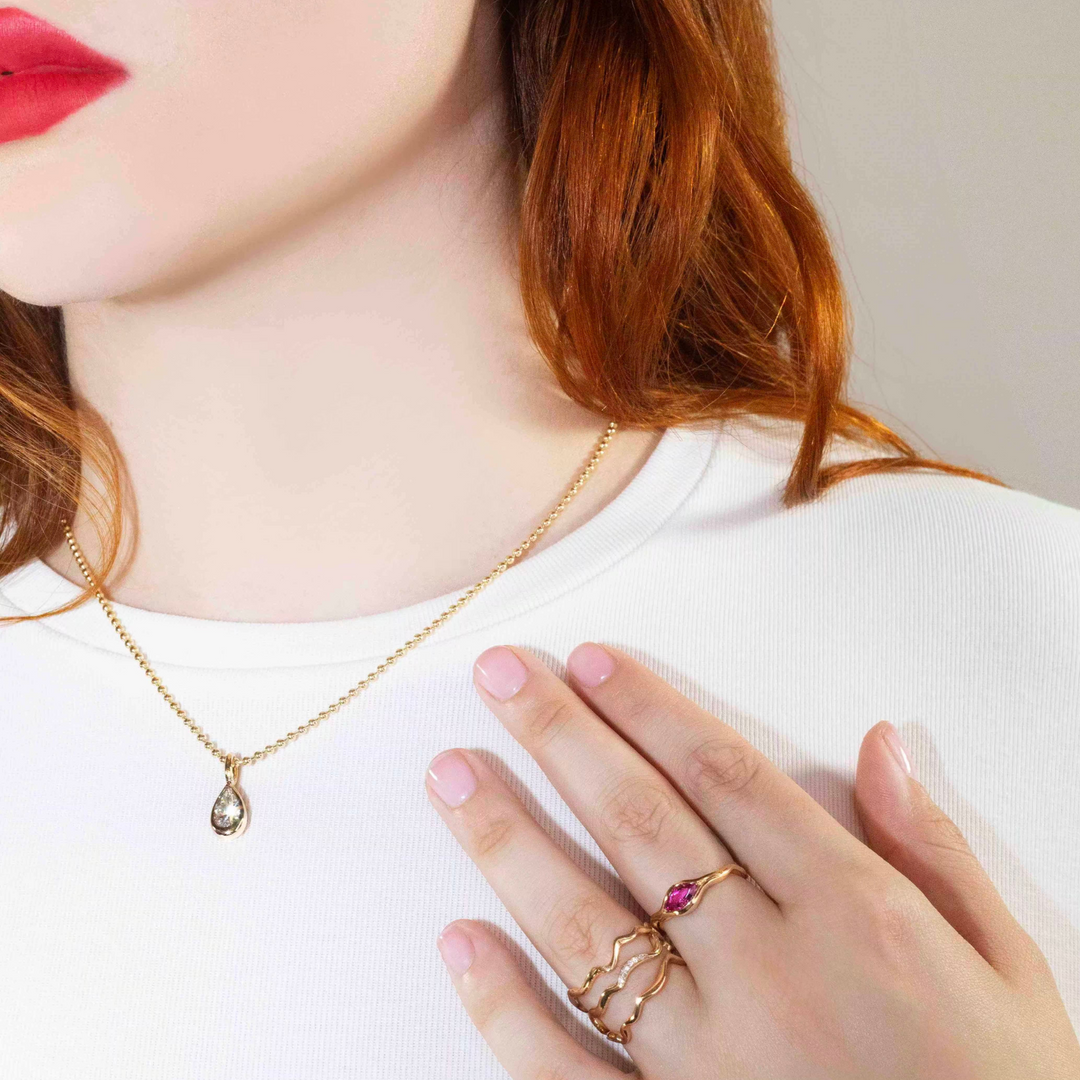 Molten Solitaire Charm - Pear – AMANDA PEARL