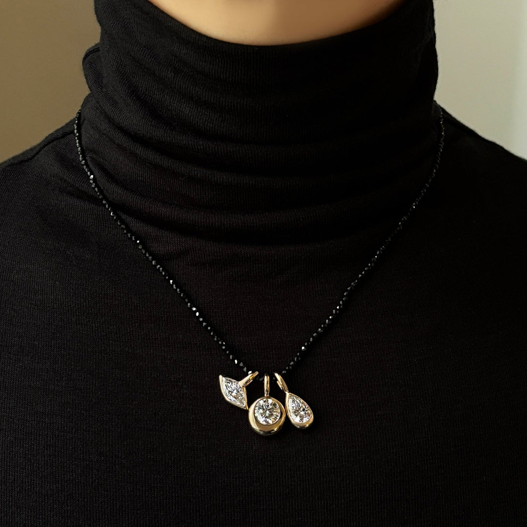 Molten Solitaire Charm - Pear – AMANDA PEARL