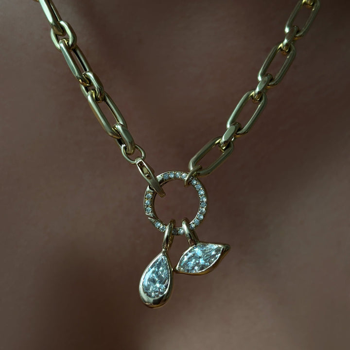 Molten Solitaire Charm - Pear – AMANDA PEARL
