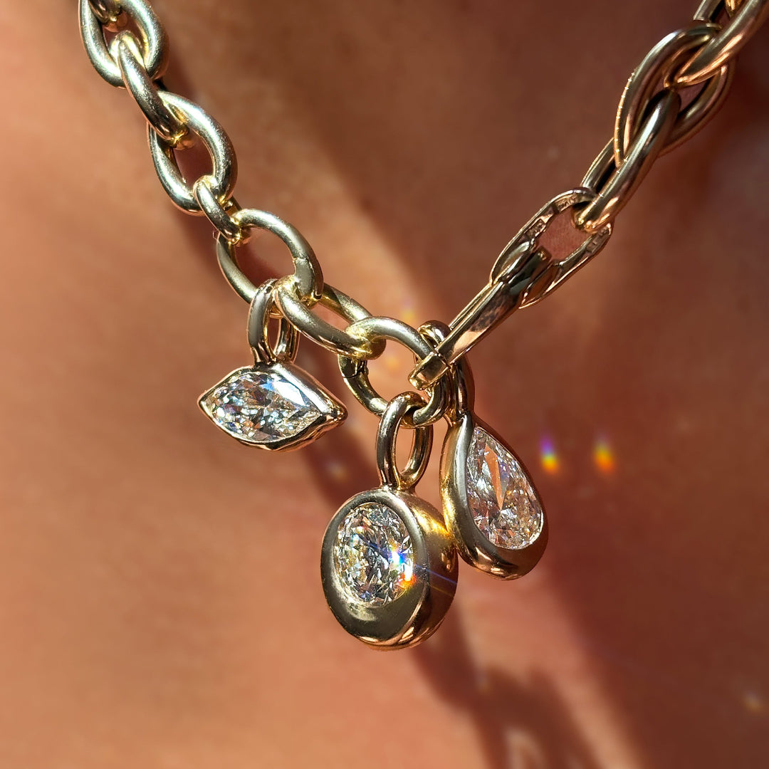 Molten Solitaire Charm - Marquise – AMANDA PEARL